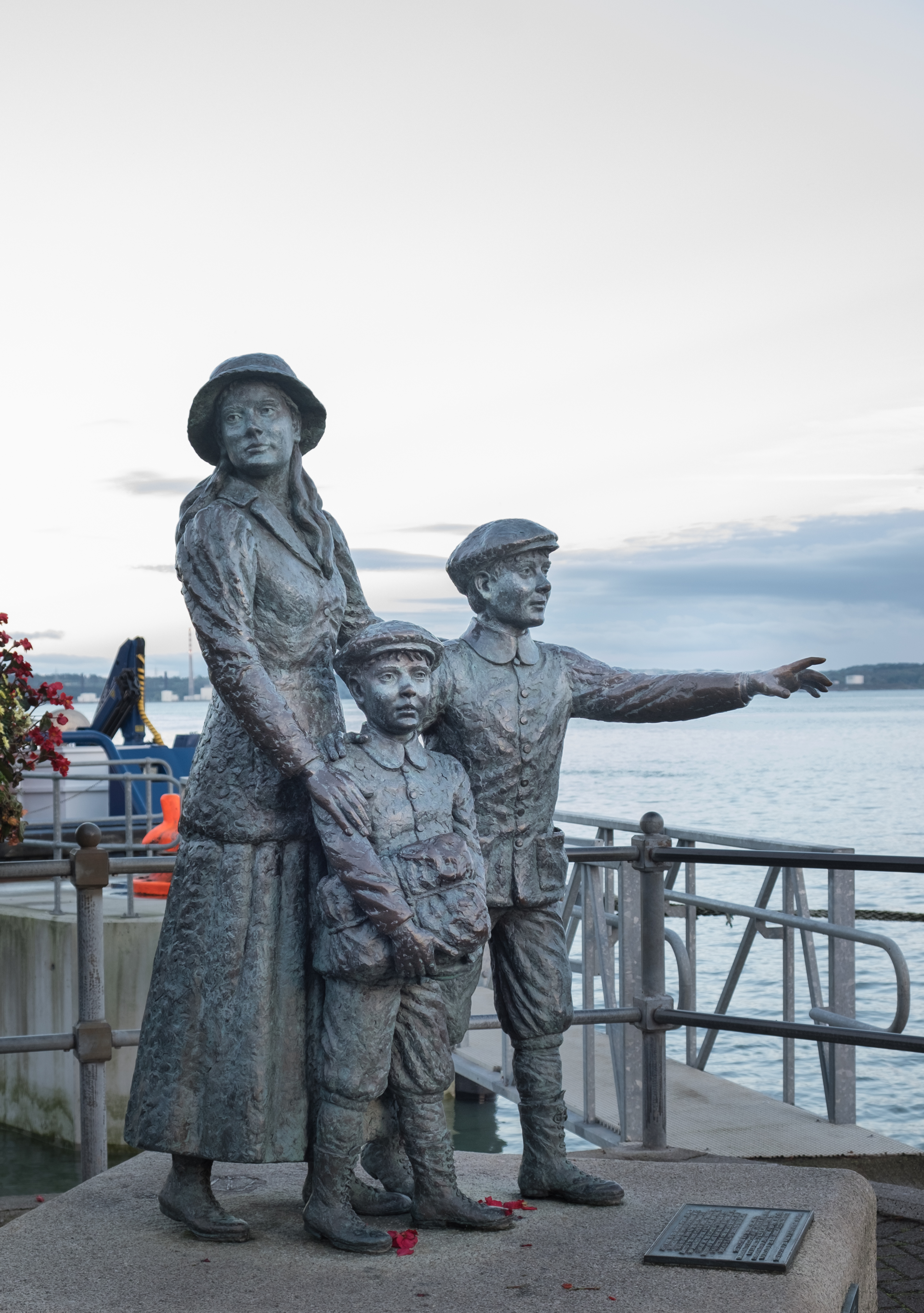 Statue on the waterfront of Annie Moore and her brothers. Annie Moore ...